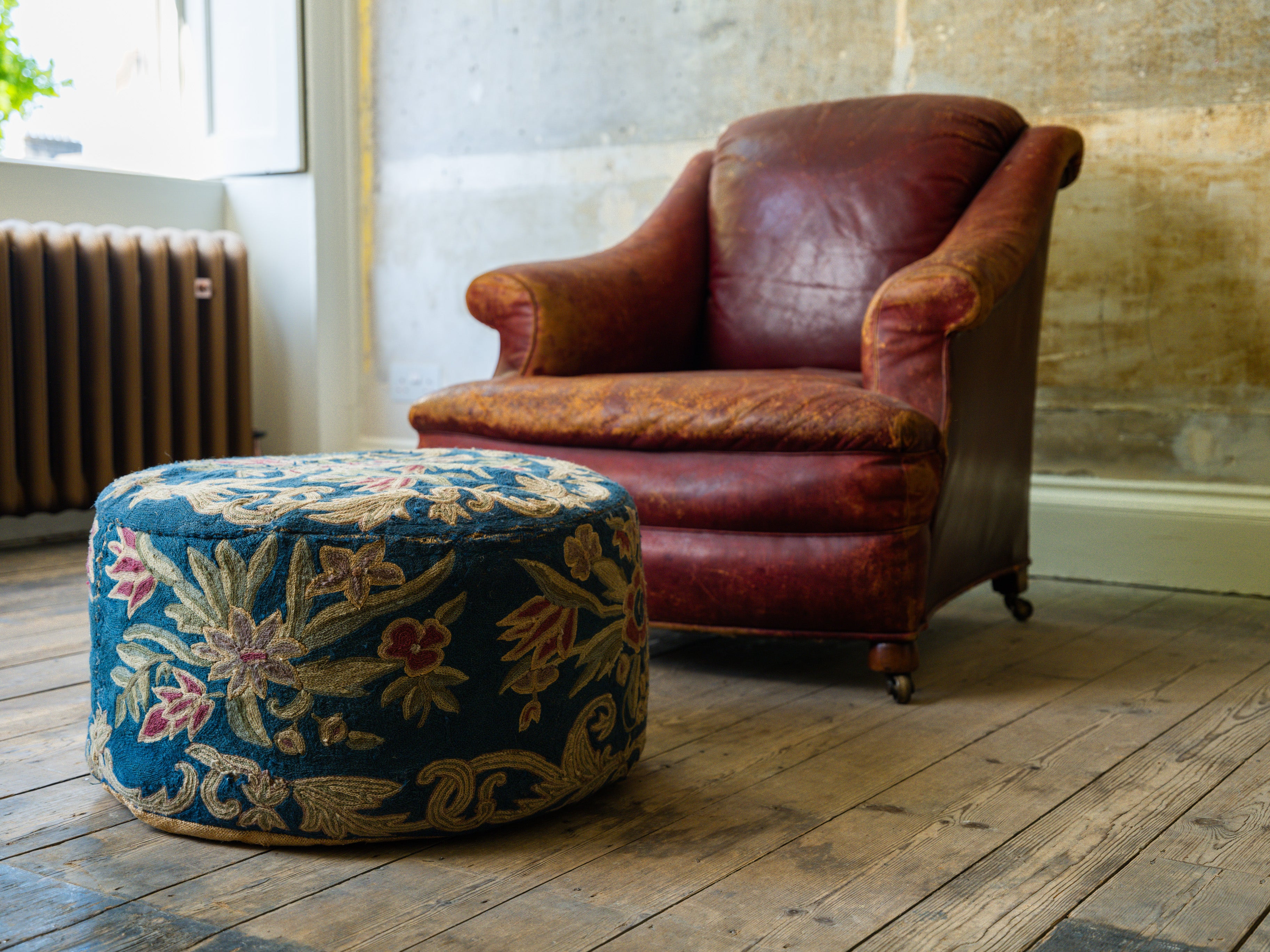 A 19th Century Crewel Work Pouffe | Drew Pritchard Ltd
